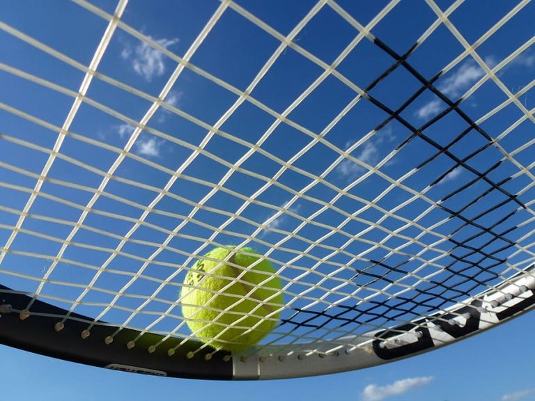 The Evolution of Tennis Equipment: From Wooden Rackets to Modern ...